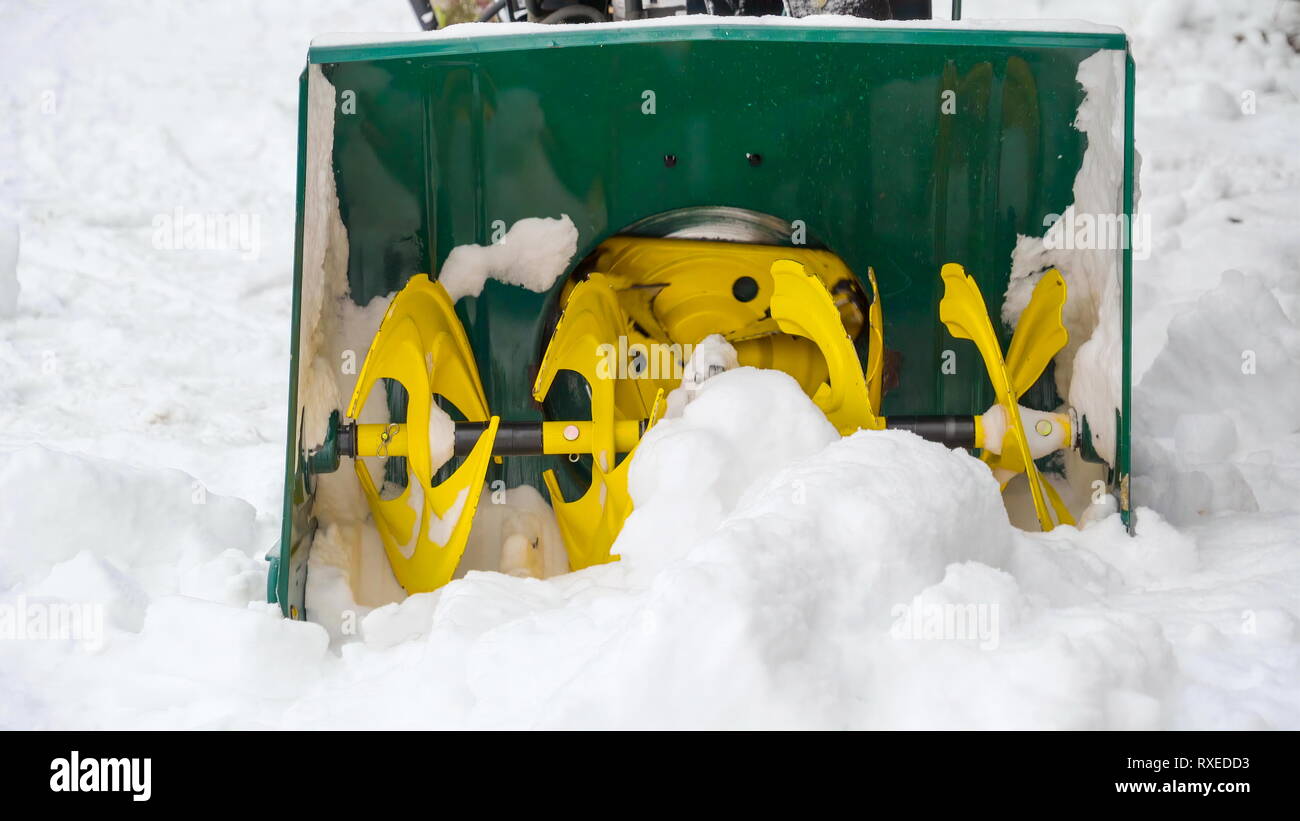 The snow scraper vehicle swirling. The machine swirling and getting off ...