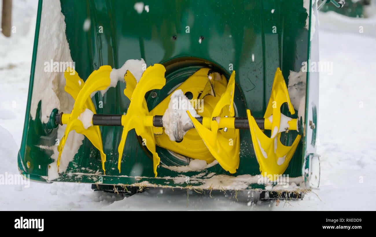The very sharp blades of the shredder that gets off thick bulky snow in ...