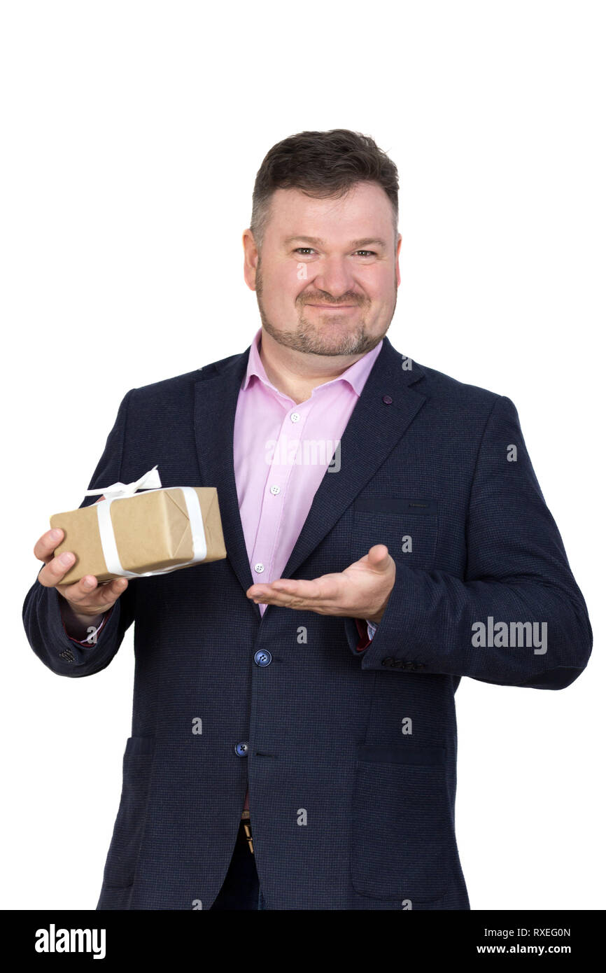 A fat man with a beard holding a gift box on a white background Stock ...