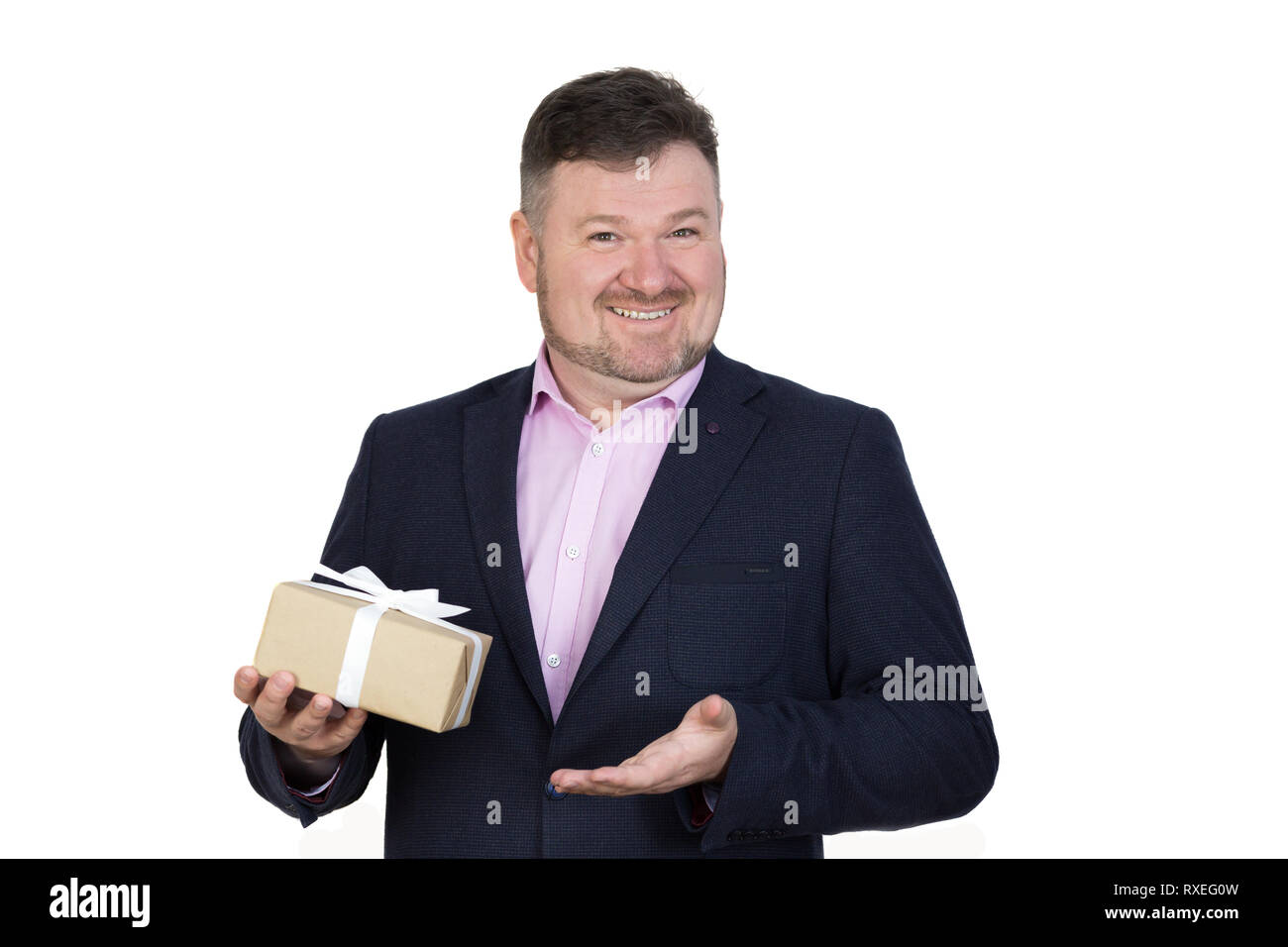 A fat man with a beard holding a gift box on a white background Stock ...