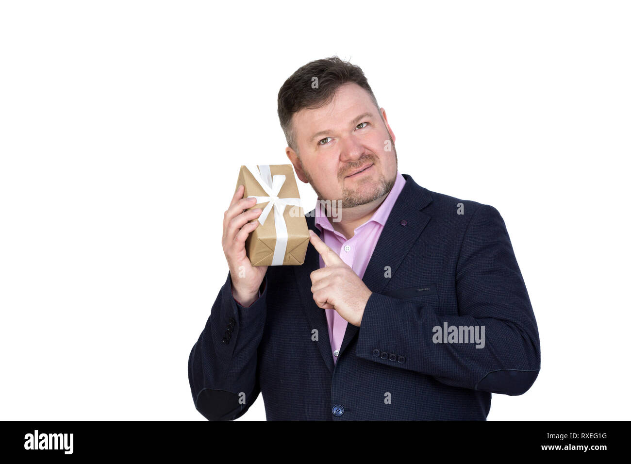 A fat man with a beard holding a gift box on a white background Stock ...