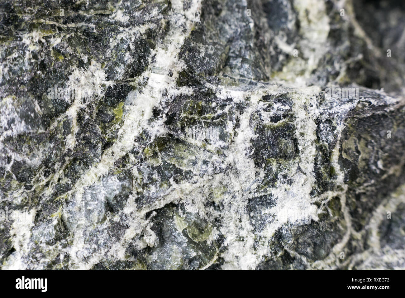 Harmful, dangerous minral. Asbestos fibers in rock close-up Stock Photo ...