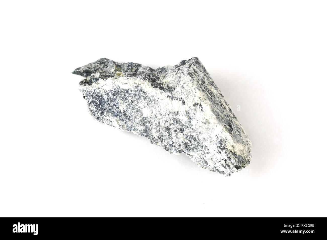 Asbestos fibers in rock close-up. Isolated. Harmful, dangerous minral ...