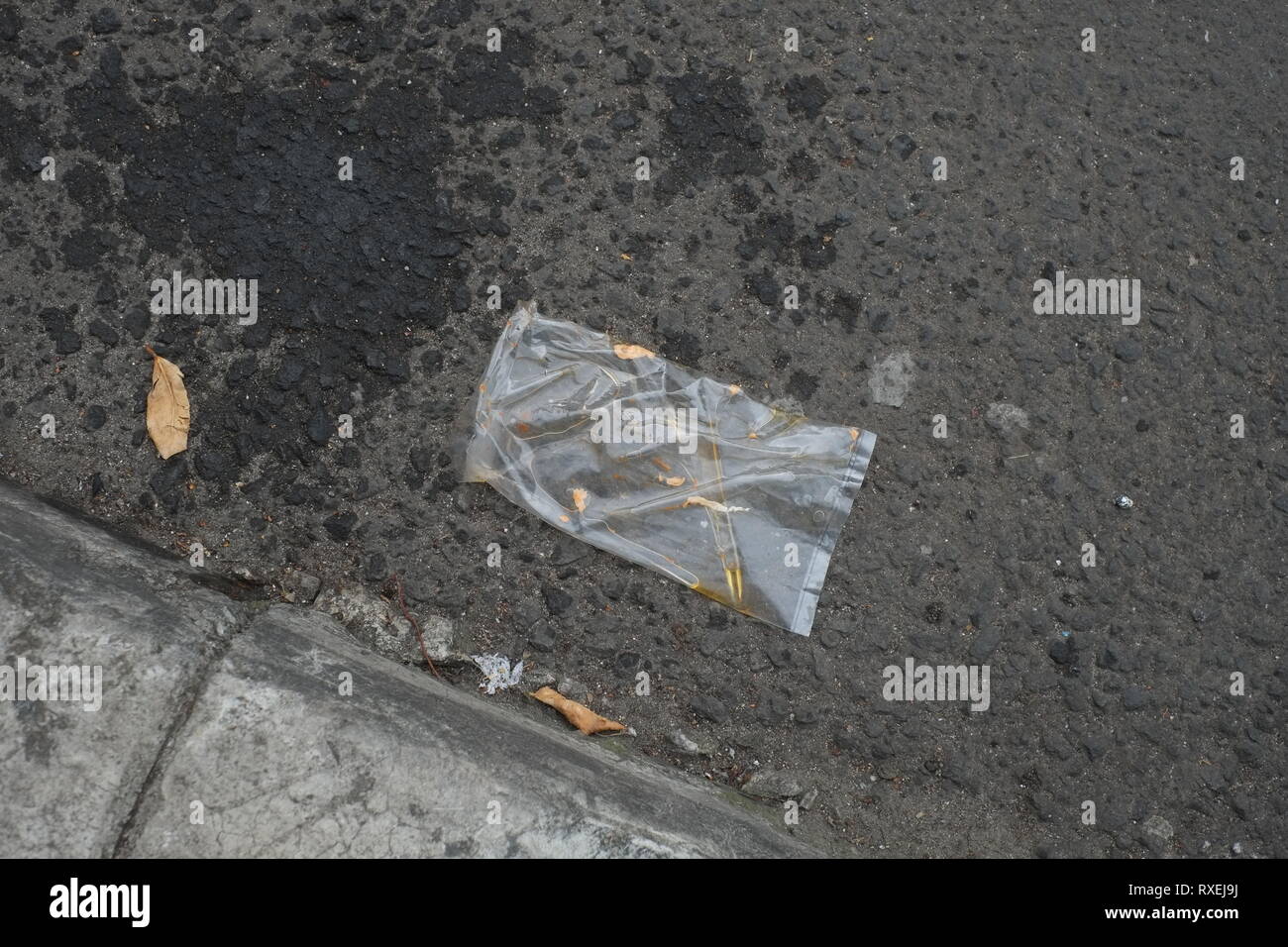 Plastic waste on streets Stock Photo - Alamy