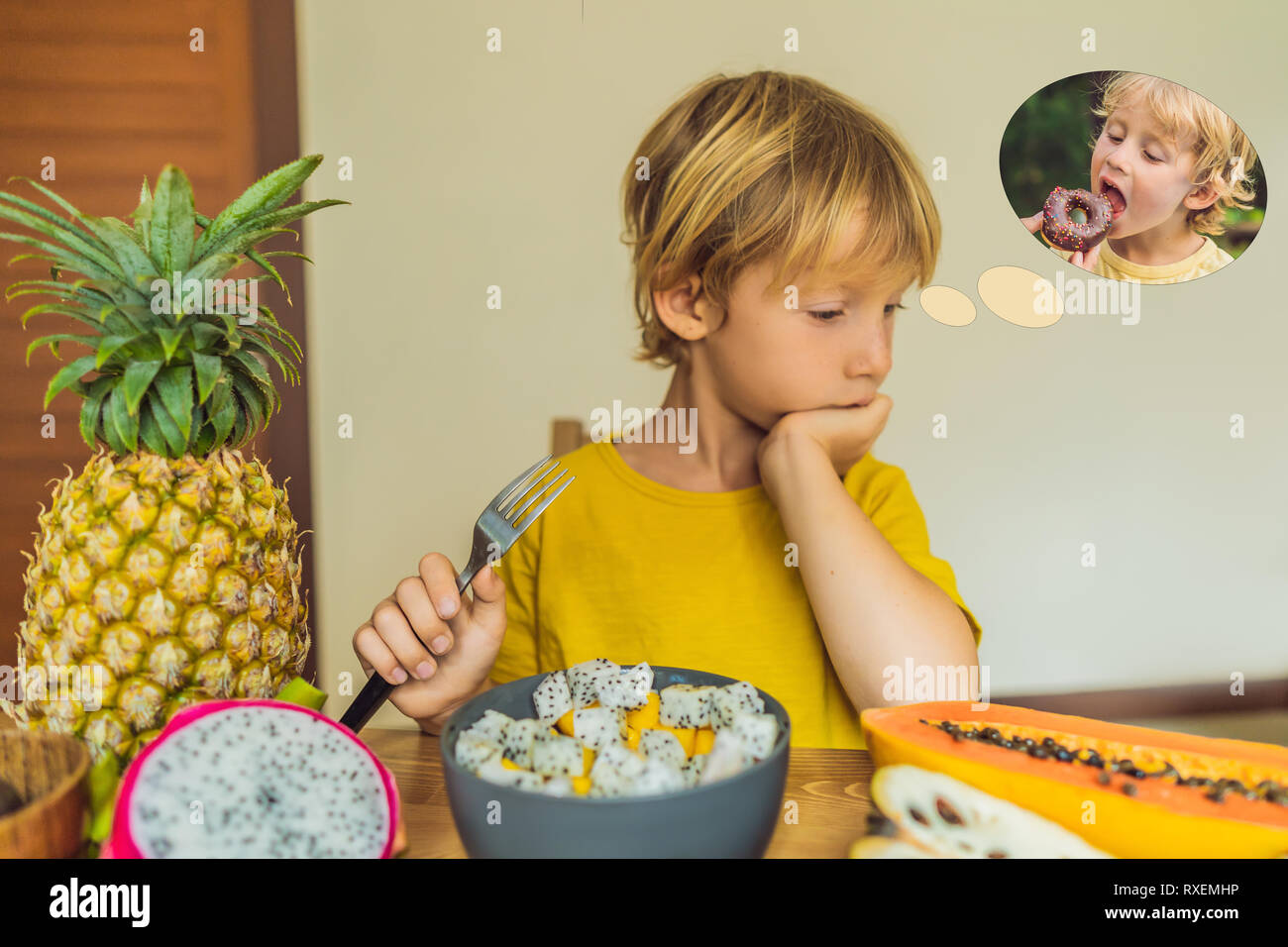 Boy eats fruit but dreams about donuts. Harmful and healthy food for ...