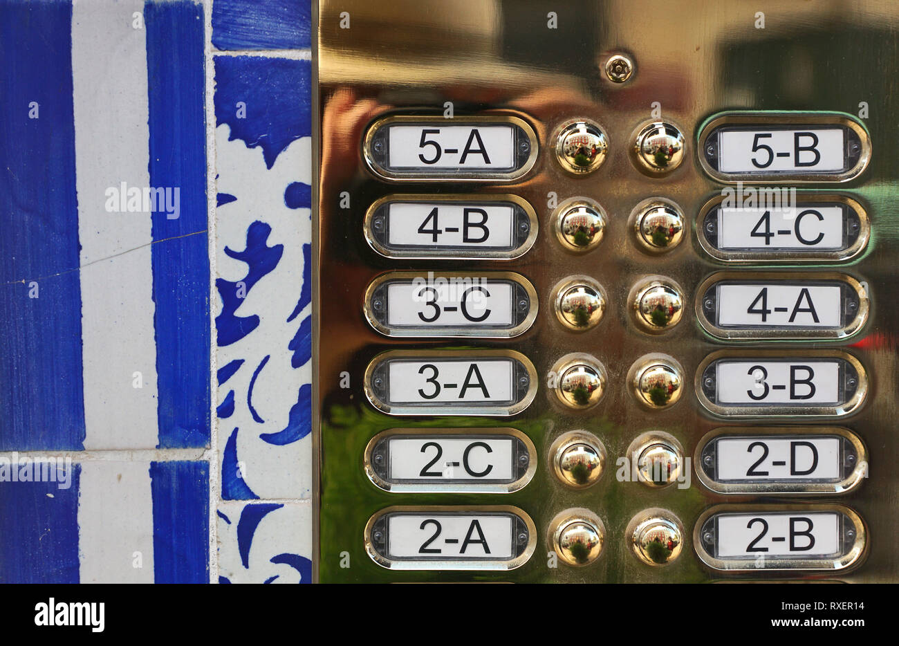 Anonymous decorative bell signs in Lisbon made of brass with Azulejo ...