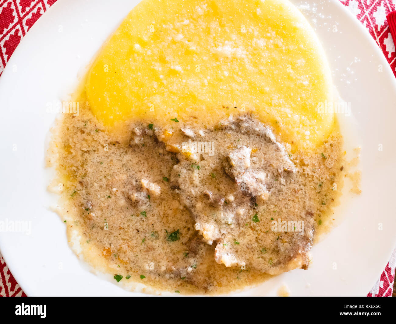 Italian cuisine - top view of Manzo all'Olio (beef stew in oil sauce ...