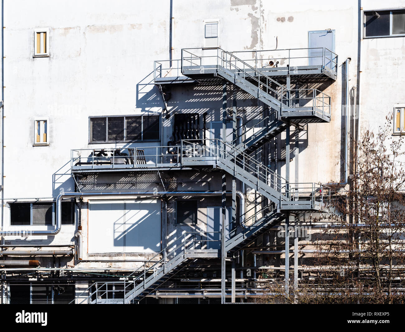 steel stairs of industrial building of factory in Certosa di Pavia town ...