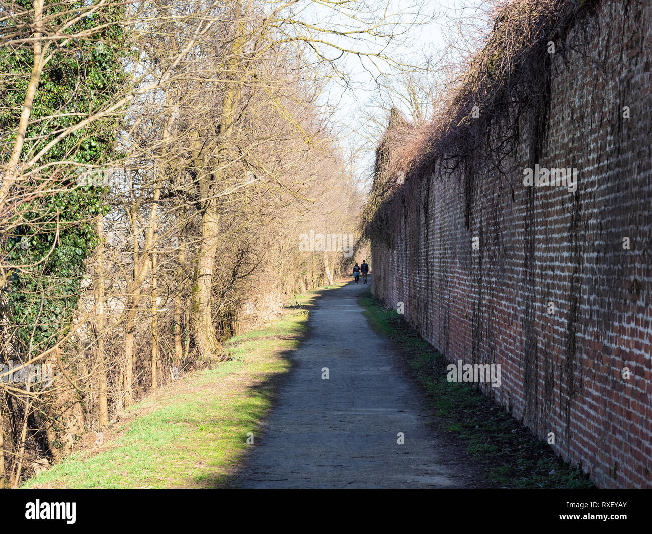 travel to Italy - footpath along ancient wall of medieval monastery in ...