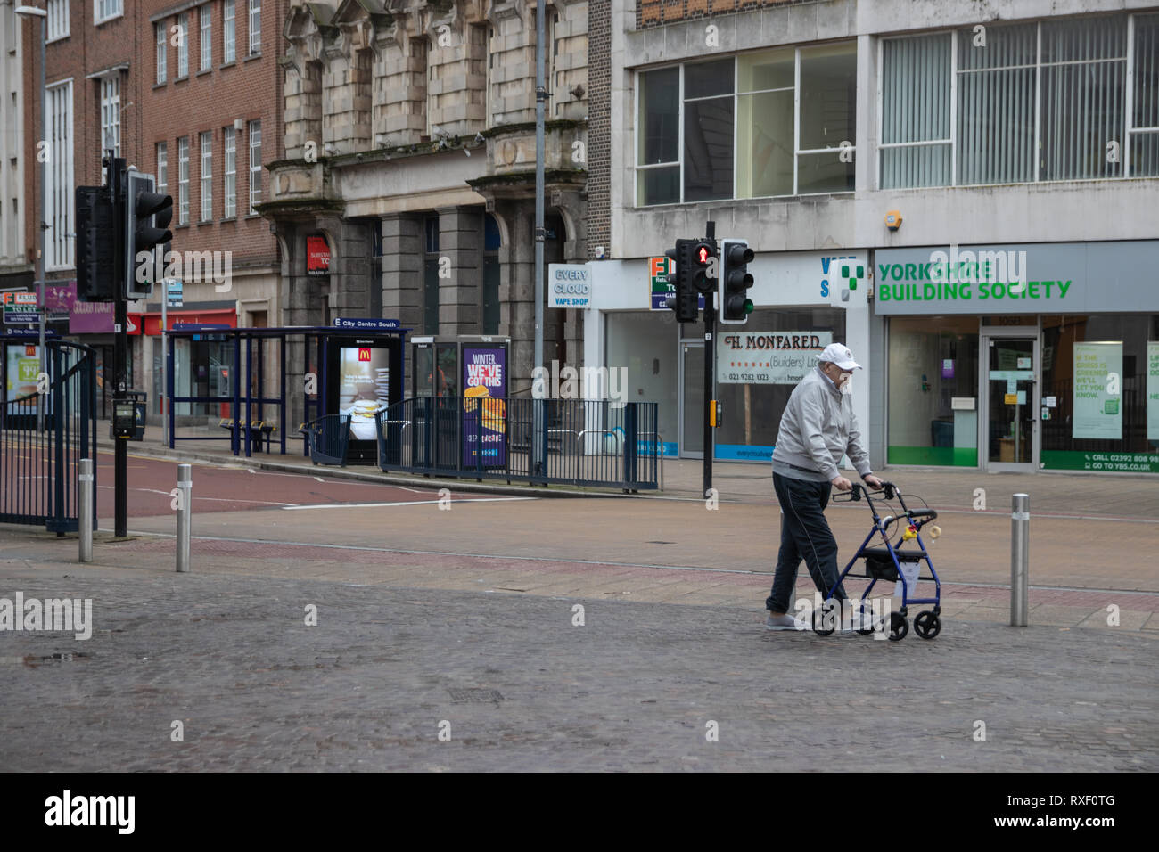 Old man with walker hi-res stock photography and images - Alamy