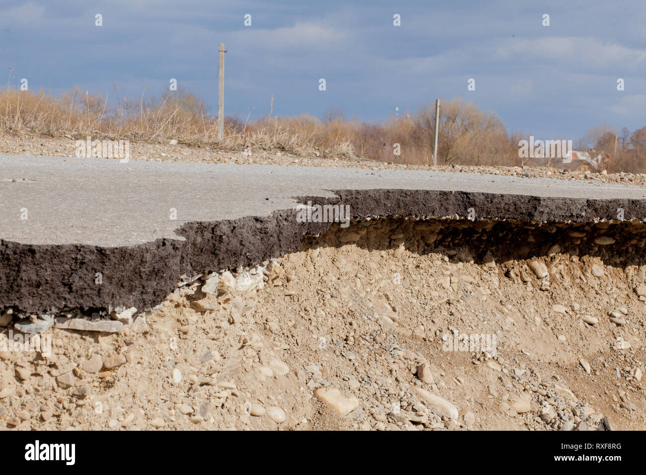 Cross section of asphalt road with blue sky background Stock Photo - Alamy