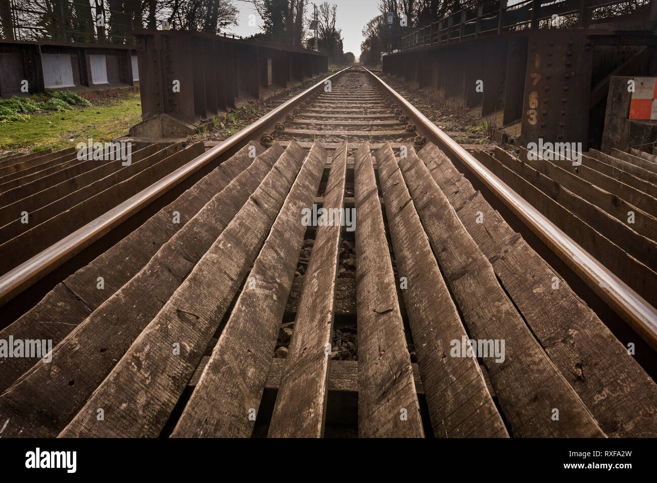 Railway liner crossing looking down rails hi-res stock photography and ...