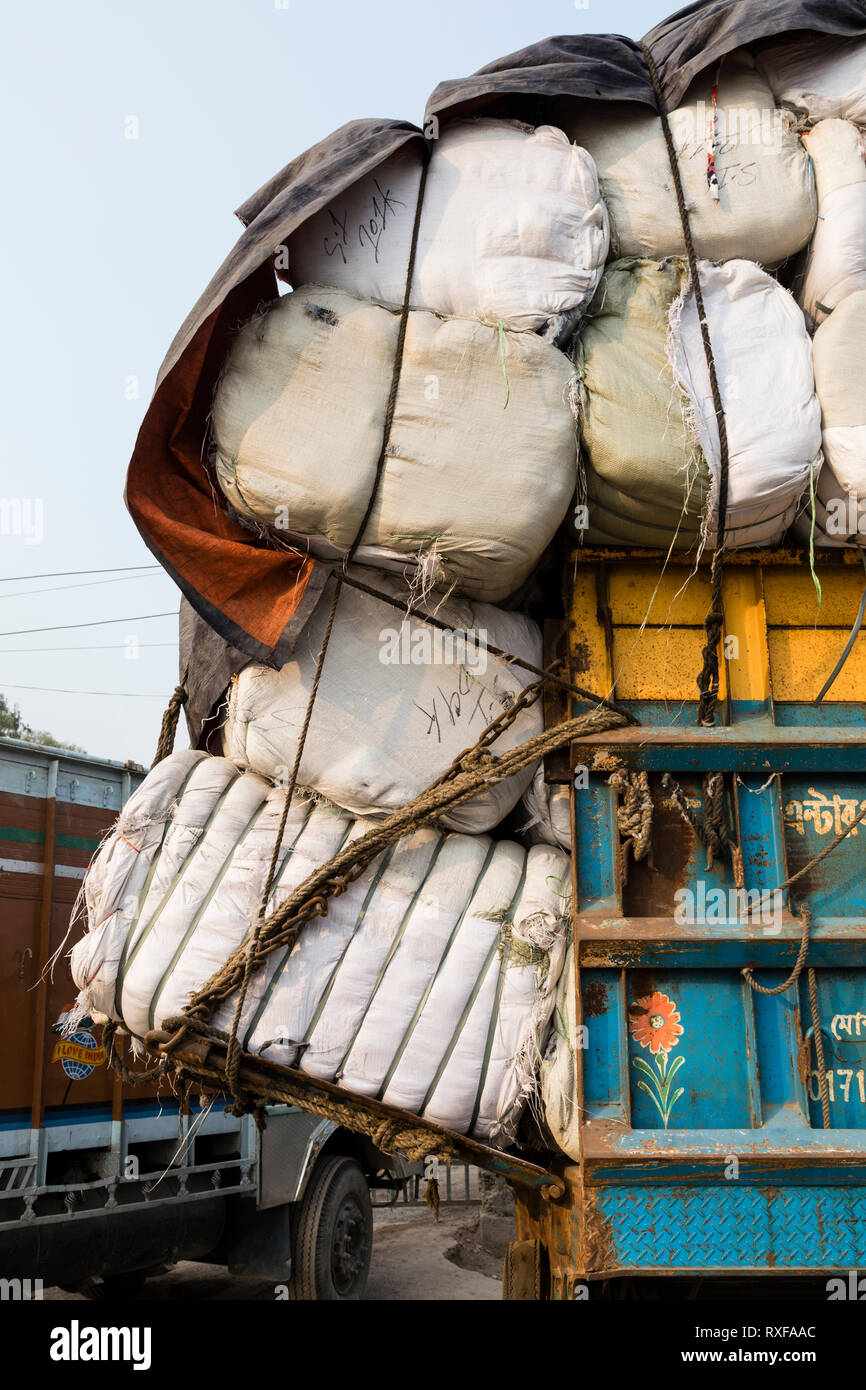 Burimari, Bangladesh, March 3 2017: Heavy loaded trucks in Burimari, a ...