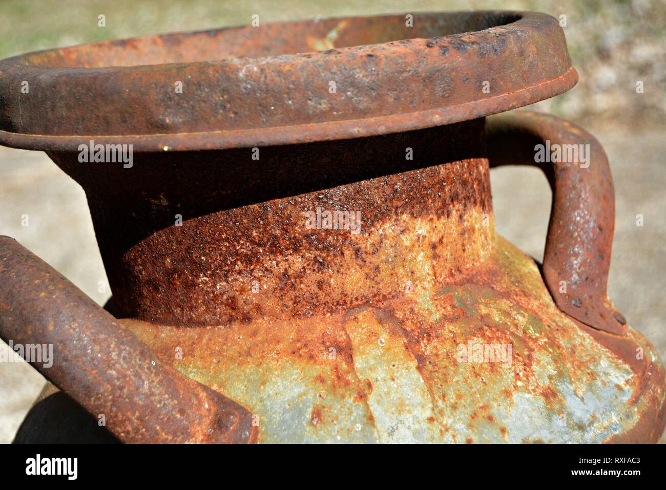 Old grey rusting milk can Stock Photo - Alamy