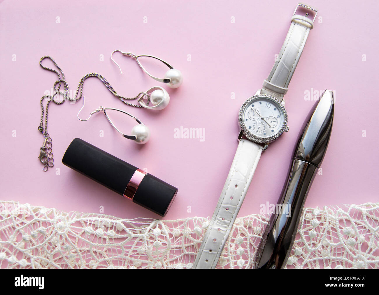 flat lay women's accessories collage with stylish watches, earrings and ...