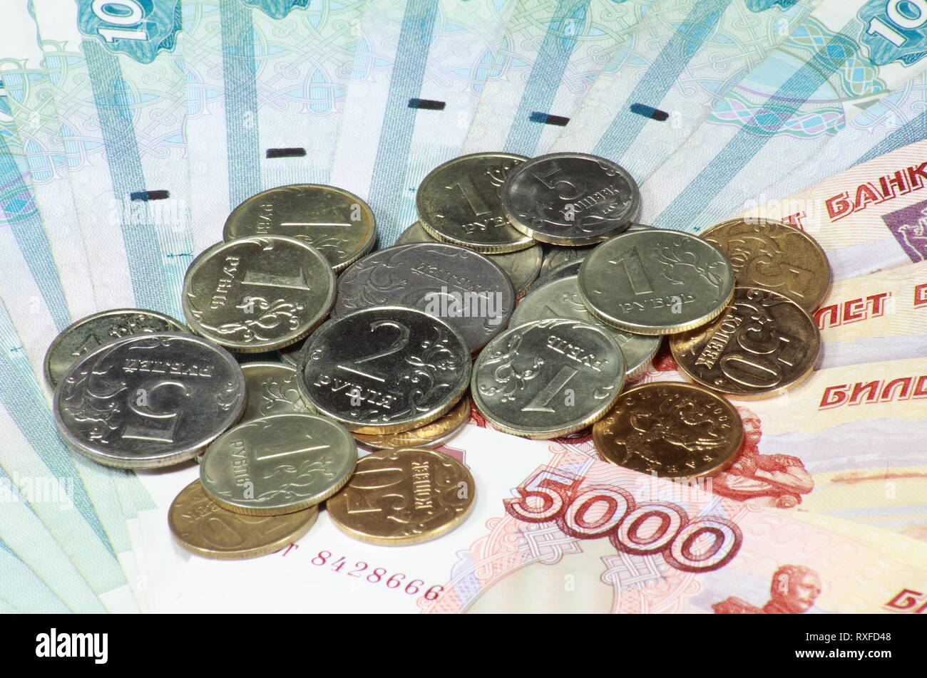 stack of coin and bond scattering Stock Photo - Alamy