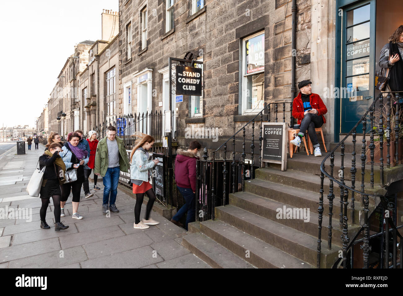Patrons entering The Stand comedy club in Edinburgh Stock Photo - Alamy