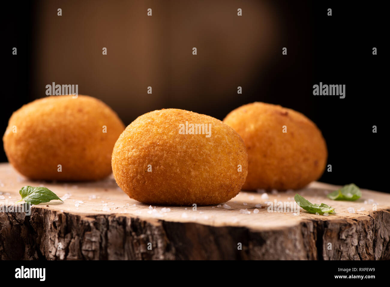 Arancini - italian rice balls which are coated with bread crumbs and ...