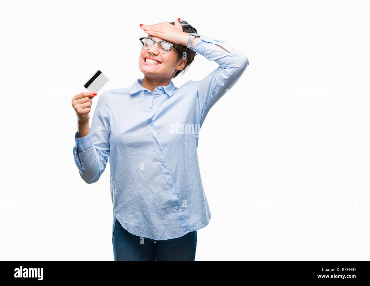 Young african american girl holding credit card over isolated ...