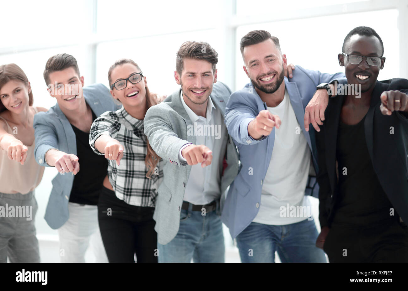 Group of people pointing at the camera and smiling - isolated Stock ...