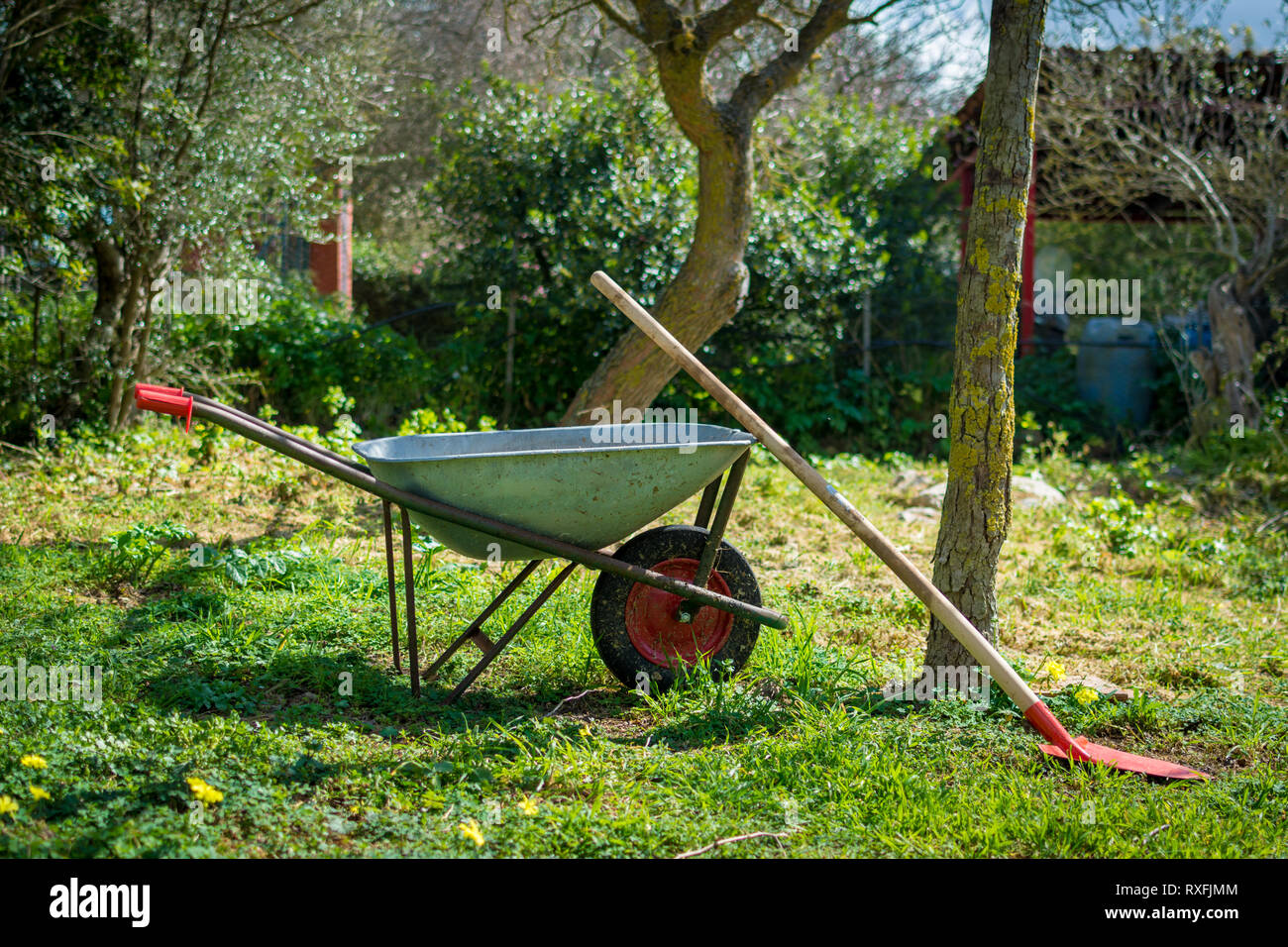 Dirty wheelbarrow hi-res stock photography and images - Alamy