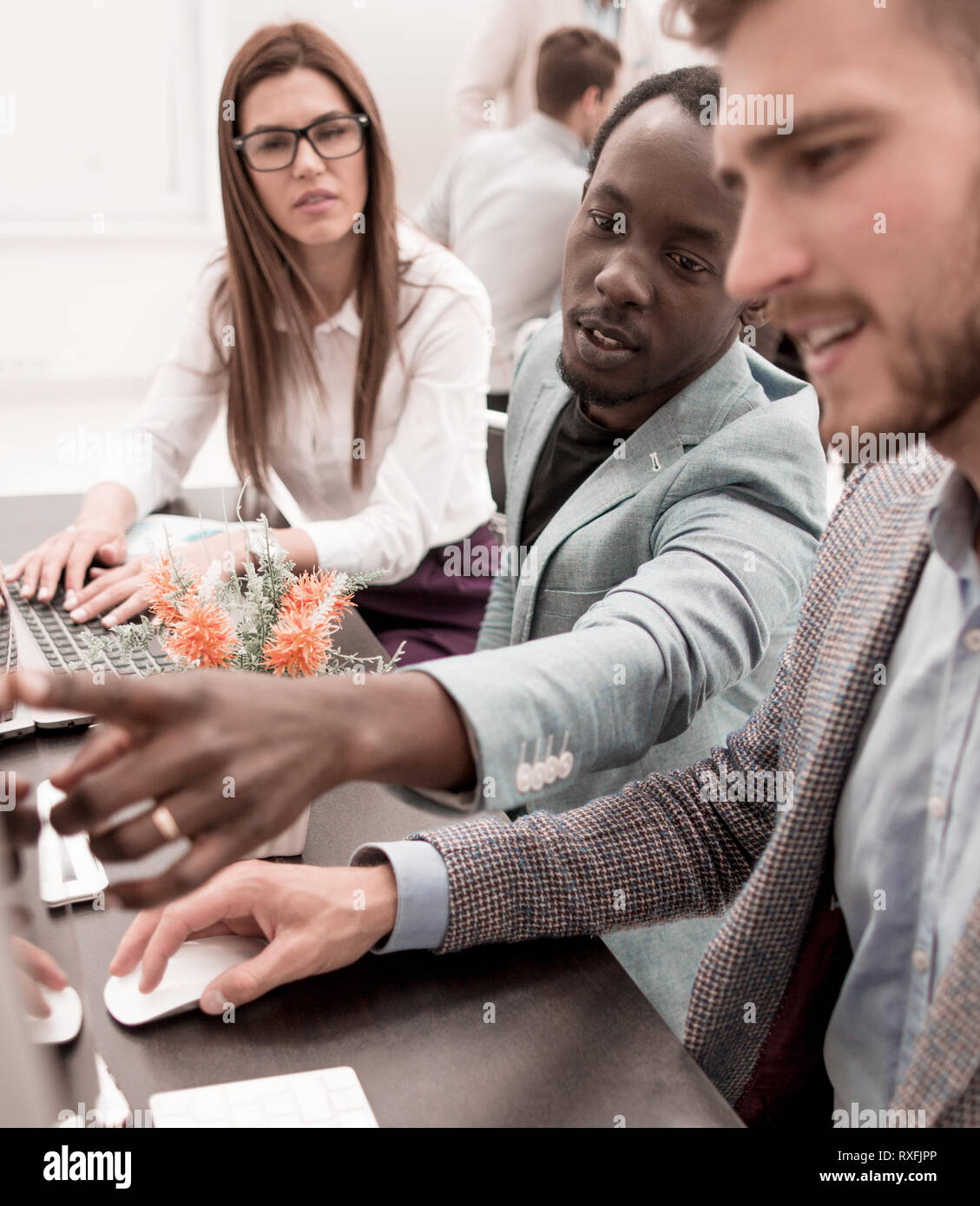 young businessman using a computer in the workplace Stock Photo - Alamy