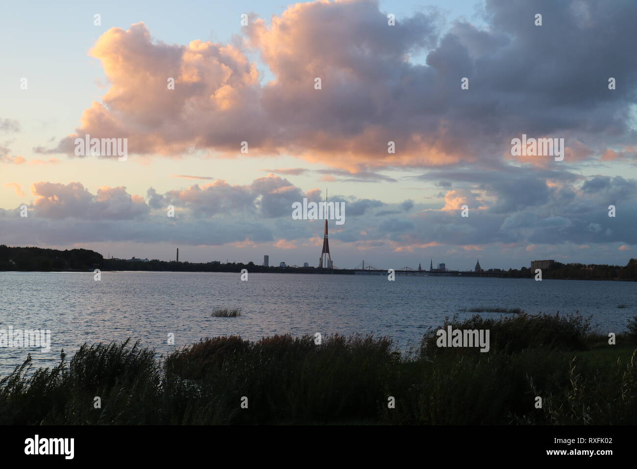Cloudy sunset scene Stock Photo - Alamy
