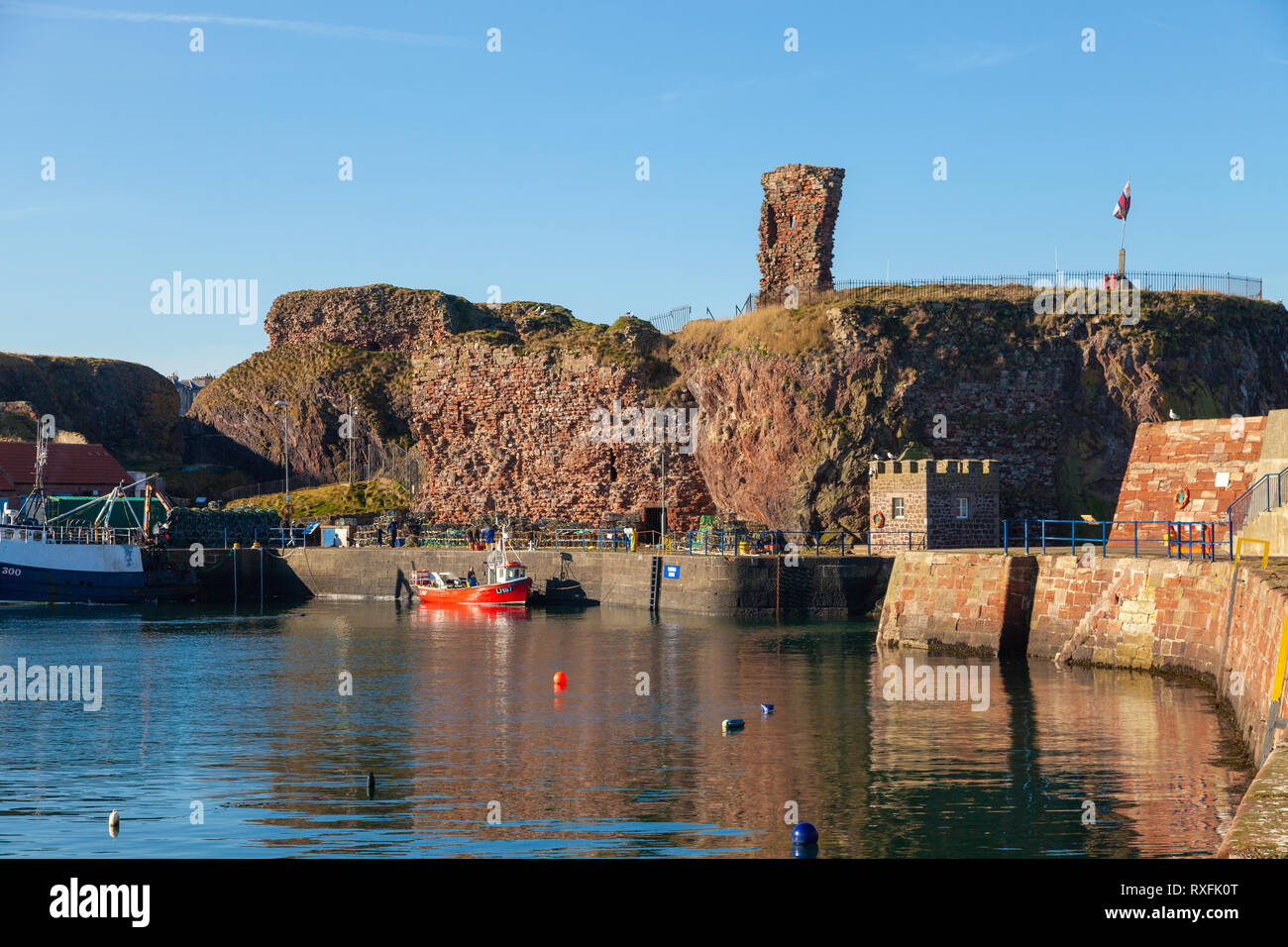 Dunbar harbour and Dunbar Castle. Dunbar, East Lothian, Scotland Stock ...