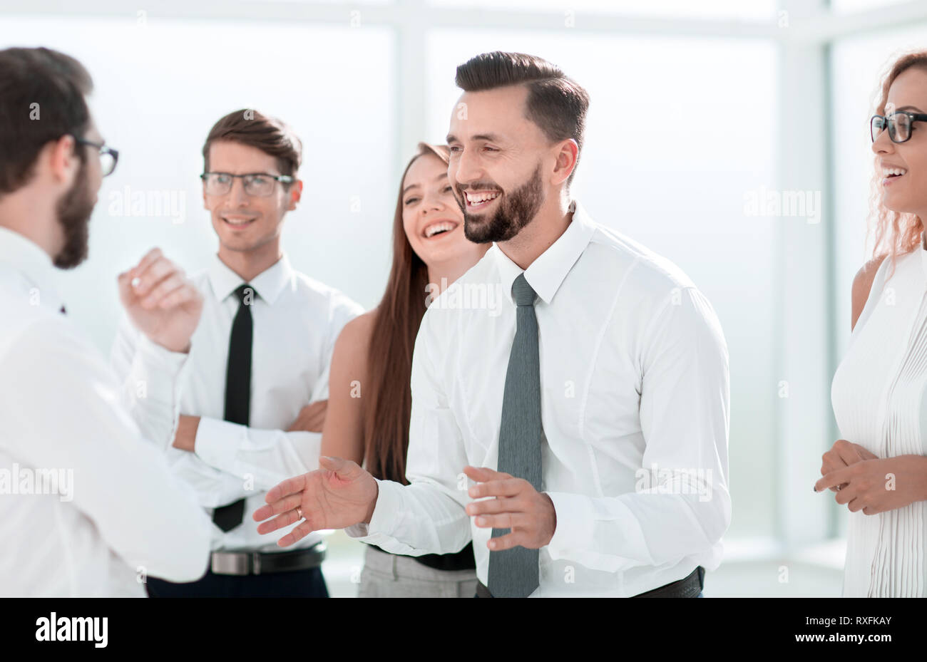 businessman explaining something to his colleague Stock Photo - Alamy