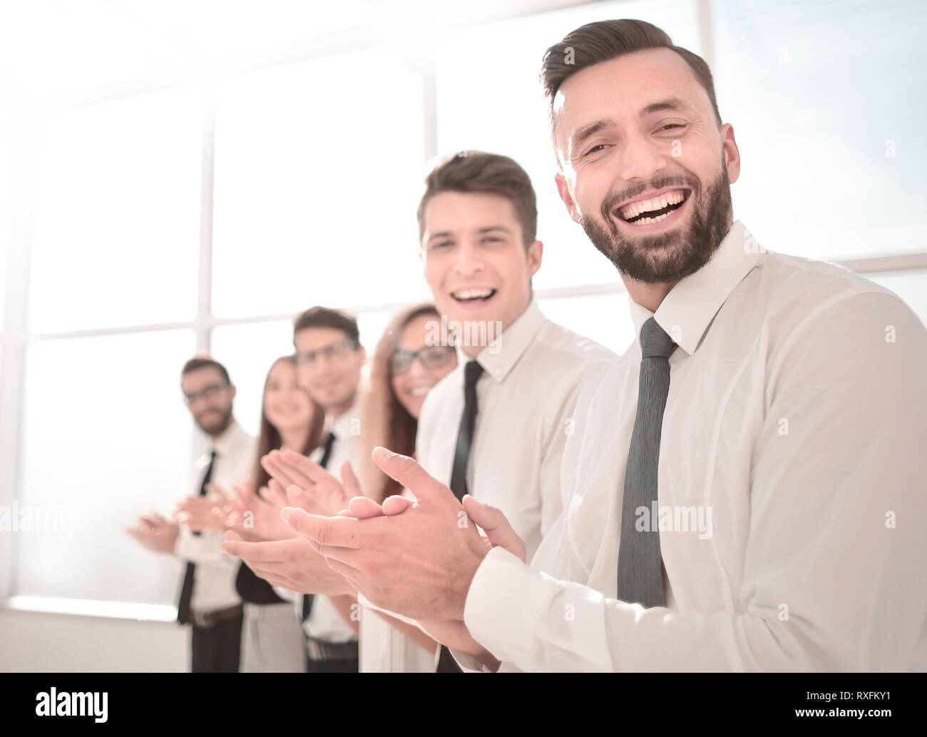 successful business people applaud standing Stock Photo - Alamy