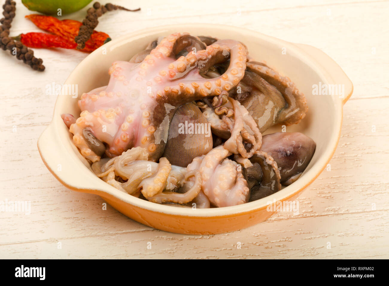 Raw octopus ready for cooking Stock Photo - Alamy