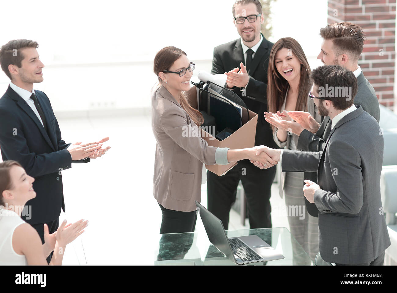 boss shaking hands with a new employee Stock Photo - Alamy