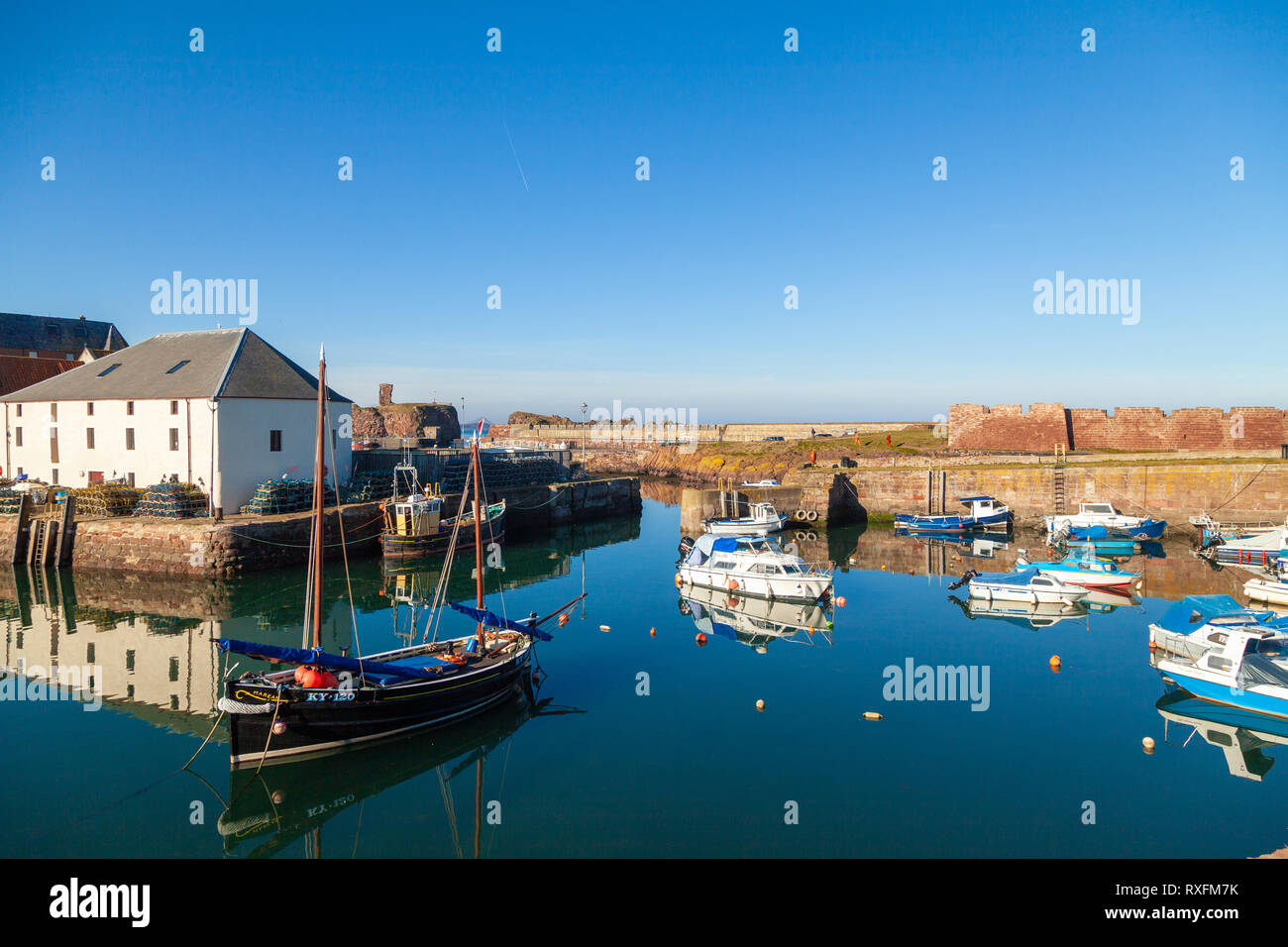 An old fishing boat moored in Dunbar Old Harbour, Dunbar, East Lothian ...