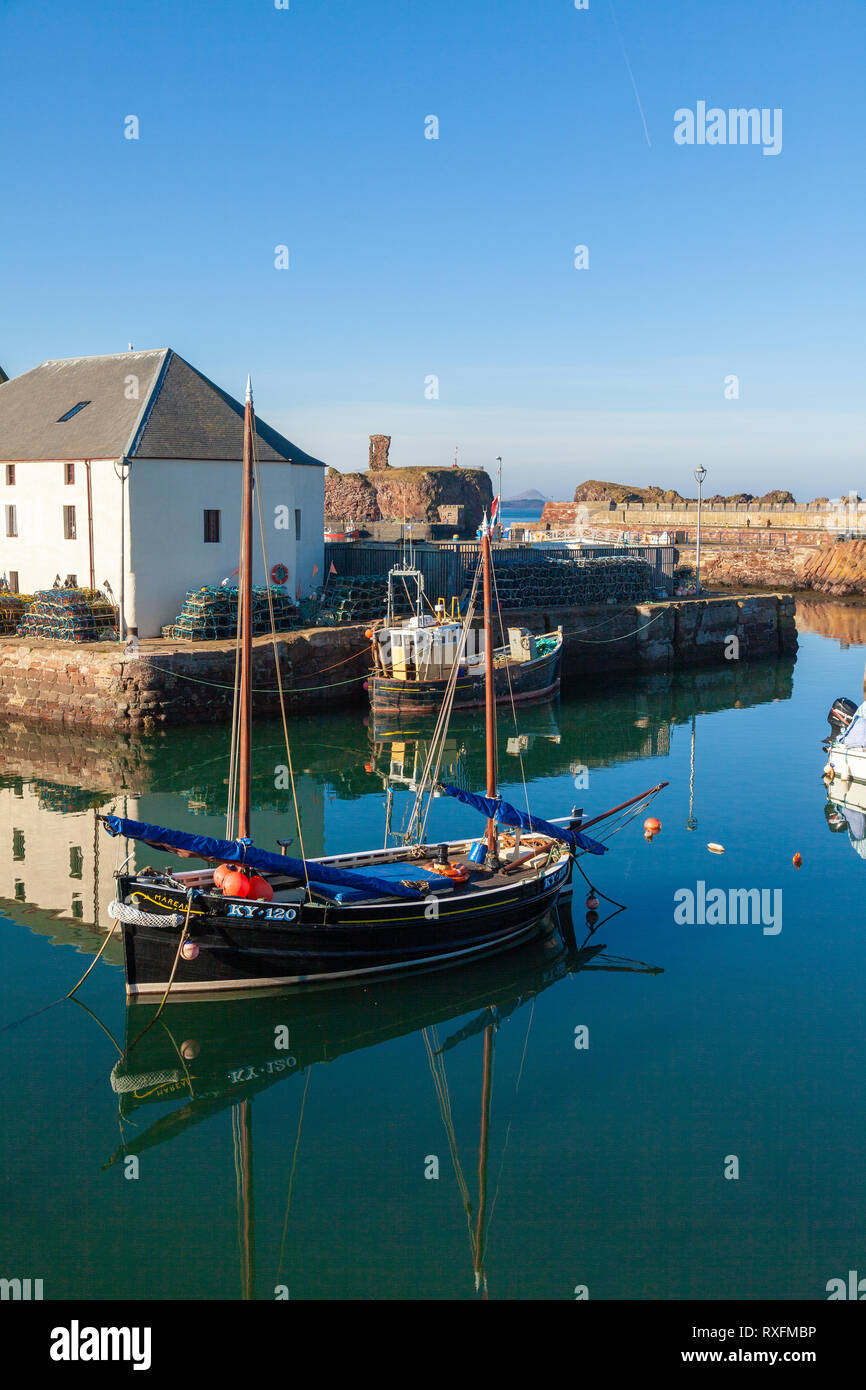 An old fishing boat moored in Dunbar Old Harbour, Dunbar, East Lothian ...