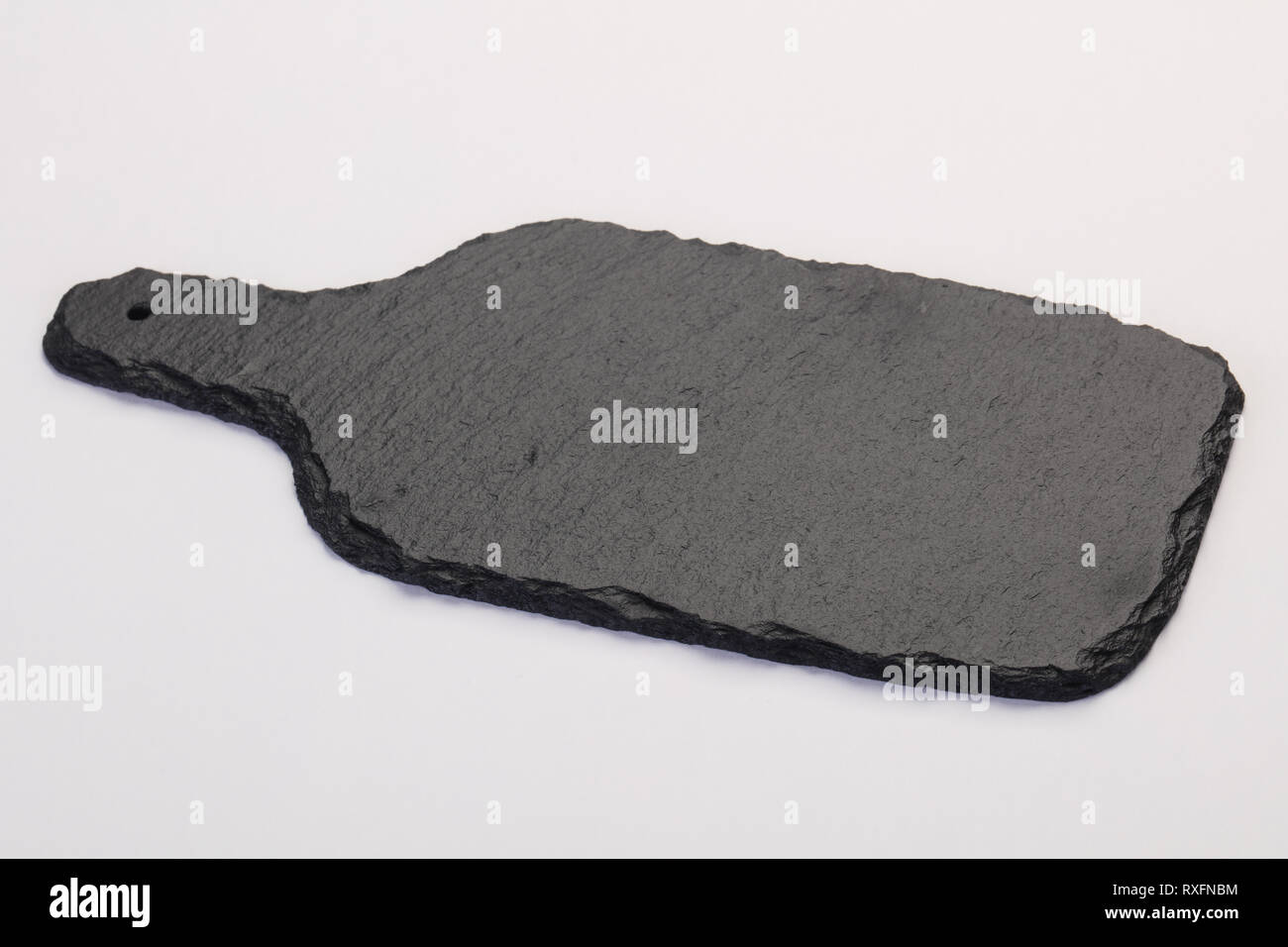 Stone board for serving dishes - kitchenware Stock Photo - Alamy
