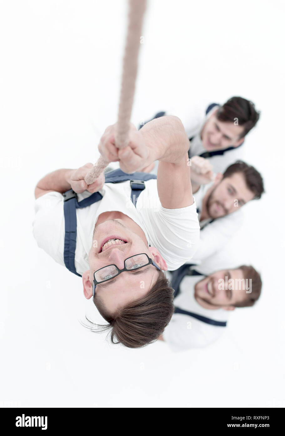 team, helping the leader to climb up the rope Stock Photo - Alamy