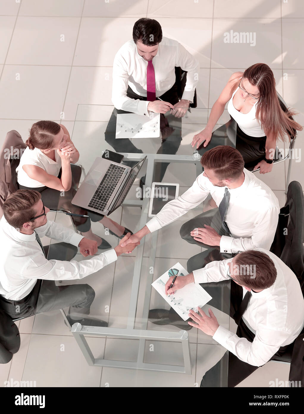 Business team discussing together business plans Stock Photo - Alamy