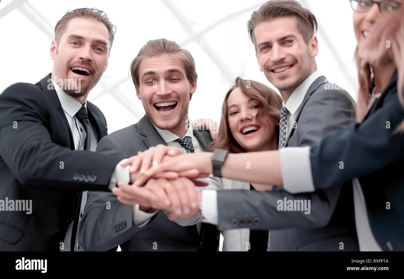 happy business team celebrating victory in office Stock Photo - Alamy