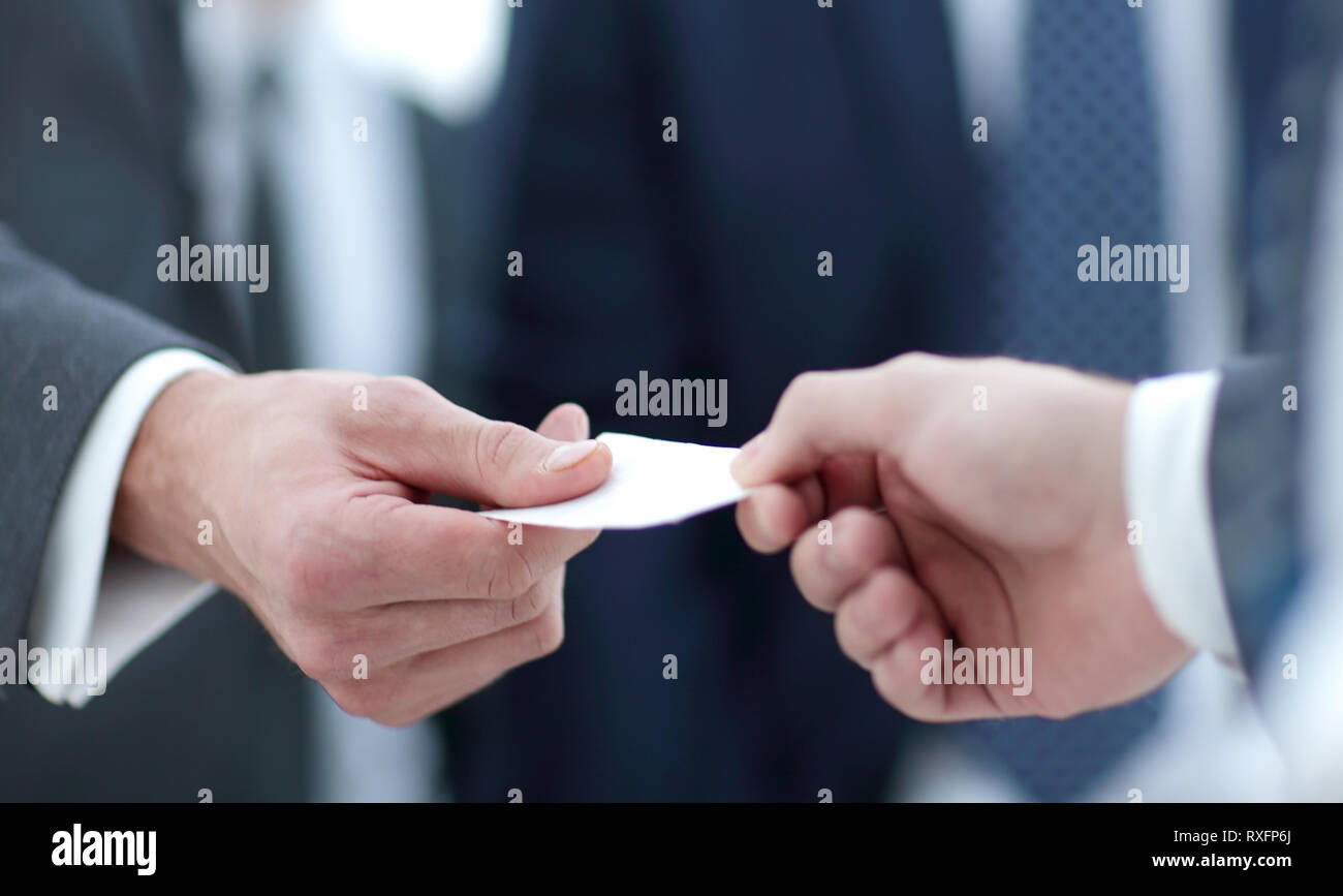 Handing business card hi-res stock photography and images - Alamy