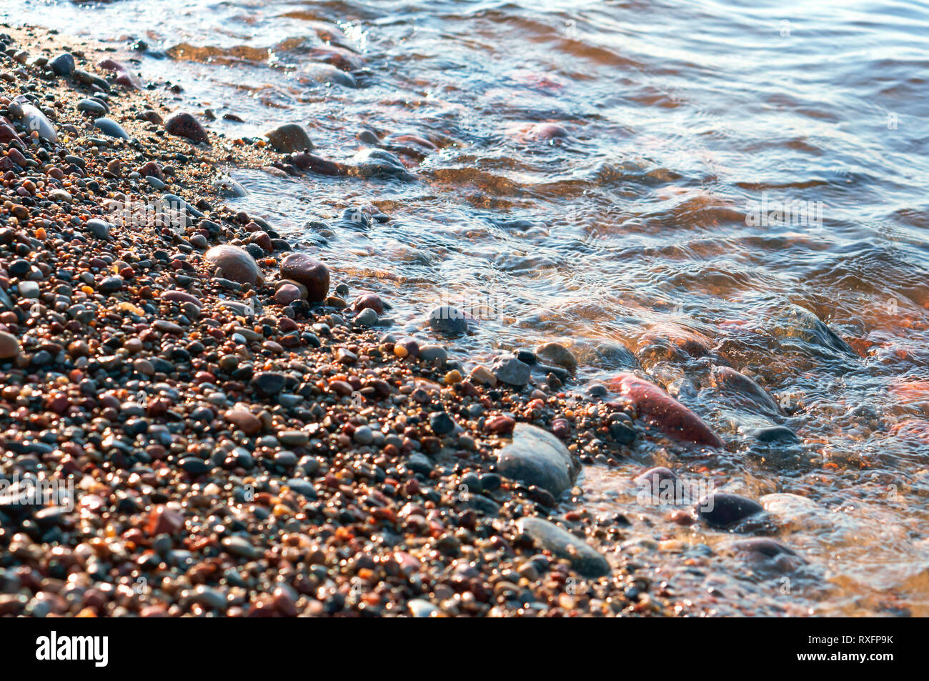 stones on the seashore, rocky seashore Stock Photo - Alamy