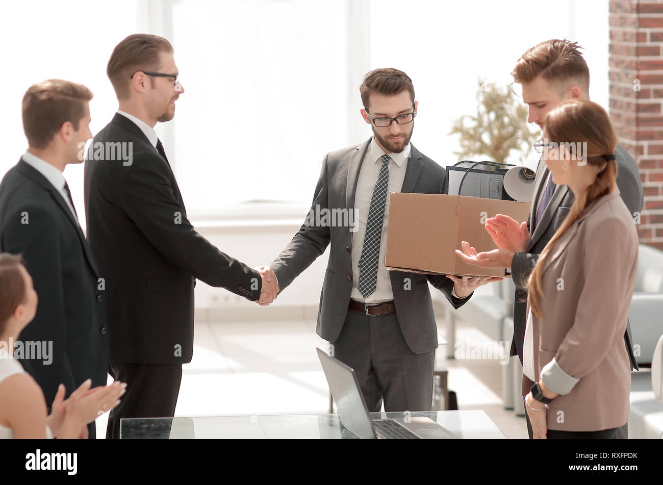 handshake Manager with a new employee in the office Stock Photo - Alamy