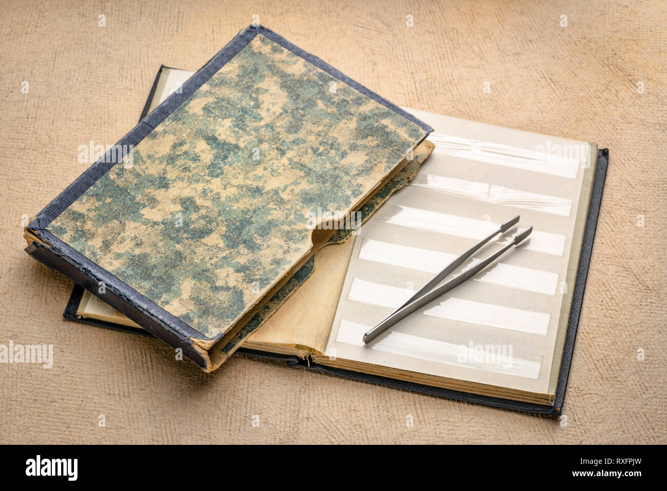 Vintage stamp album hi-res stock photography and images - Alamy