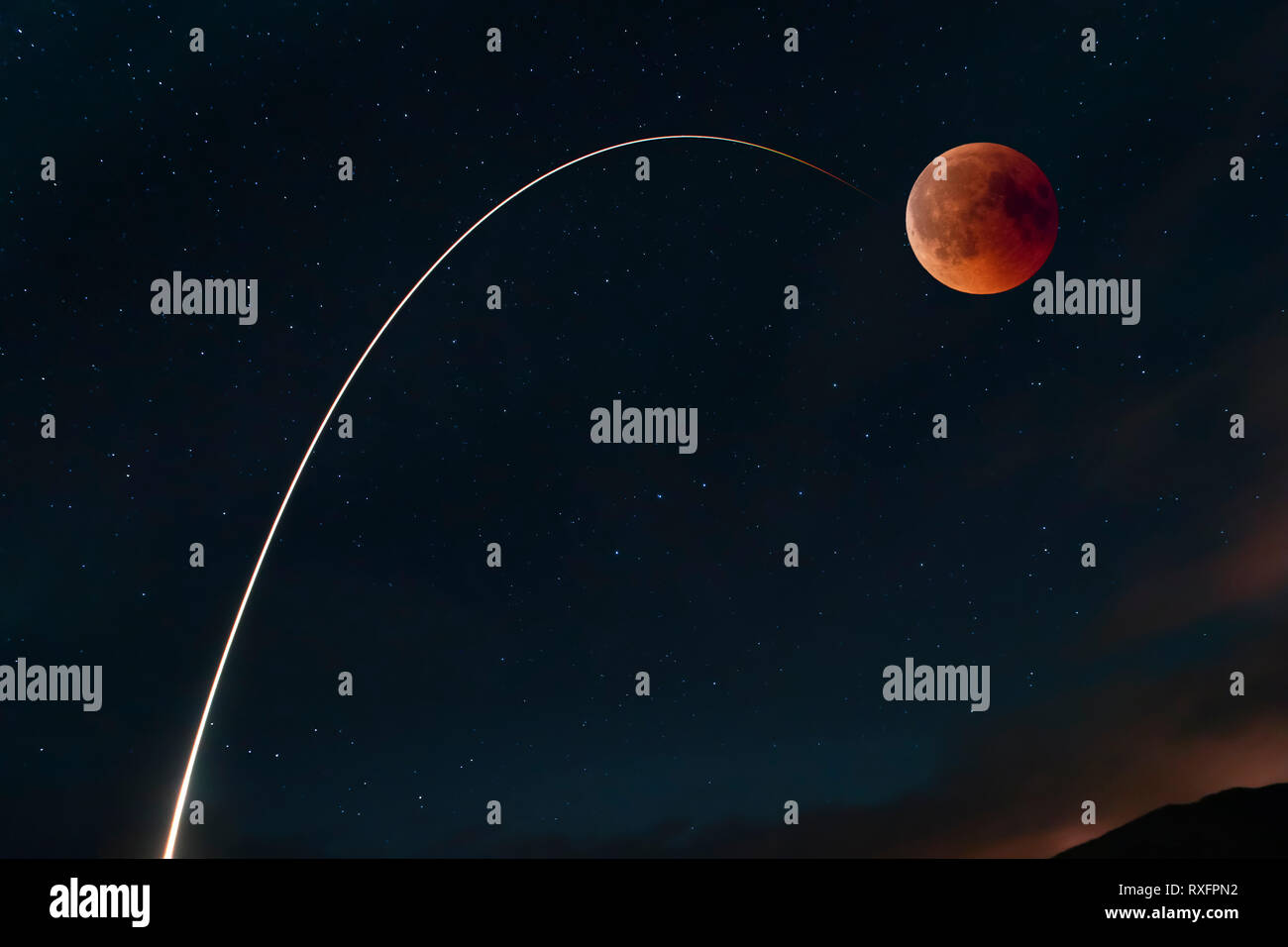 Rocket launch towards the moon Stock Photo - Alamy