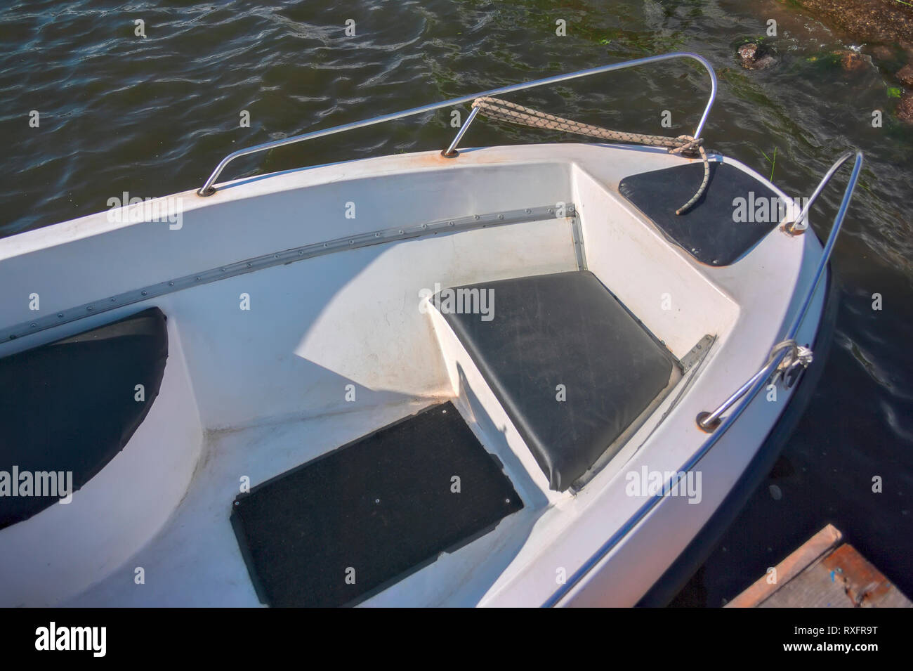 stern of the pleasure boat at the pier close-up Stock Photo - Alamy