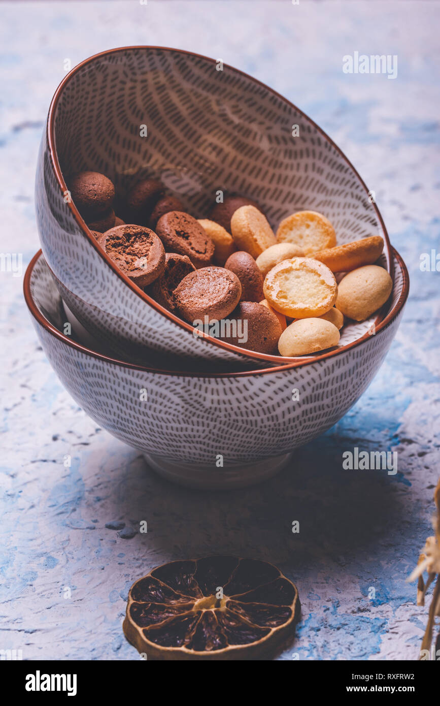 Sponge biscuits in chocolate hi-res stock photography and images - Alamy