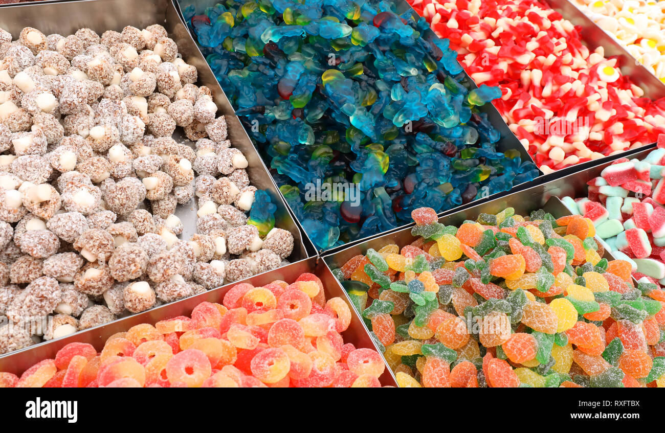 many colorful and sugary candies in the candy store Stock Photo - Alamy