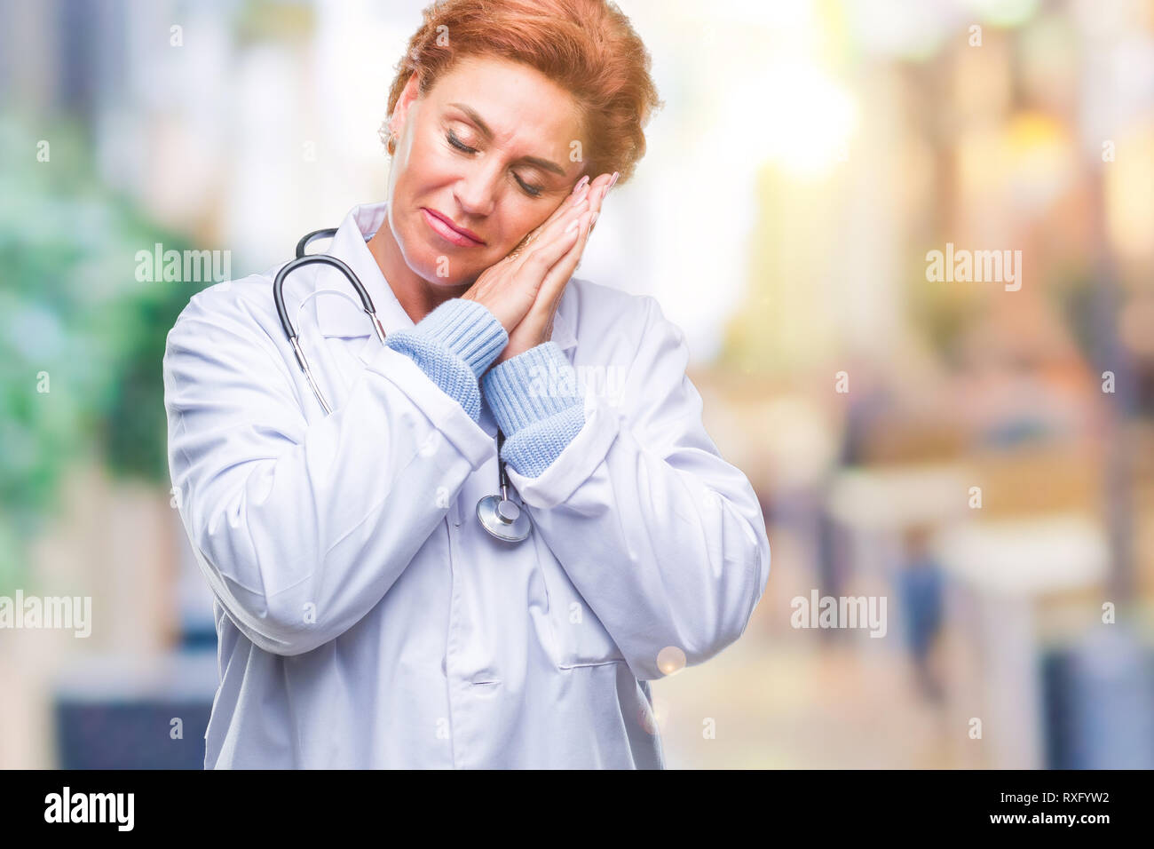 Senior caucasian doctor woman wearing medical uniform over isolated ...