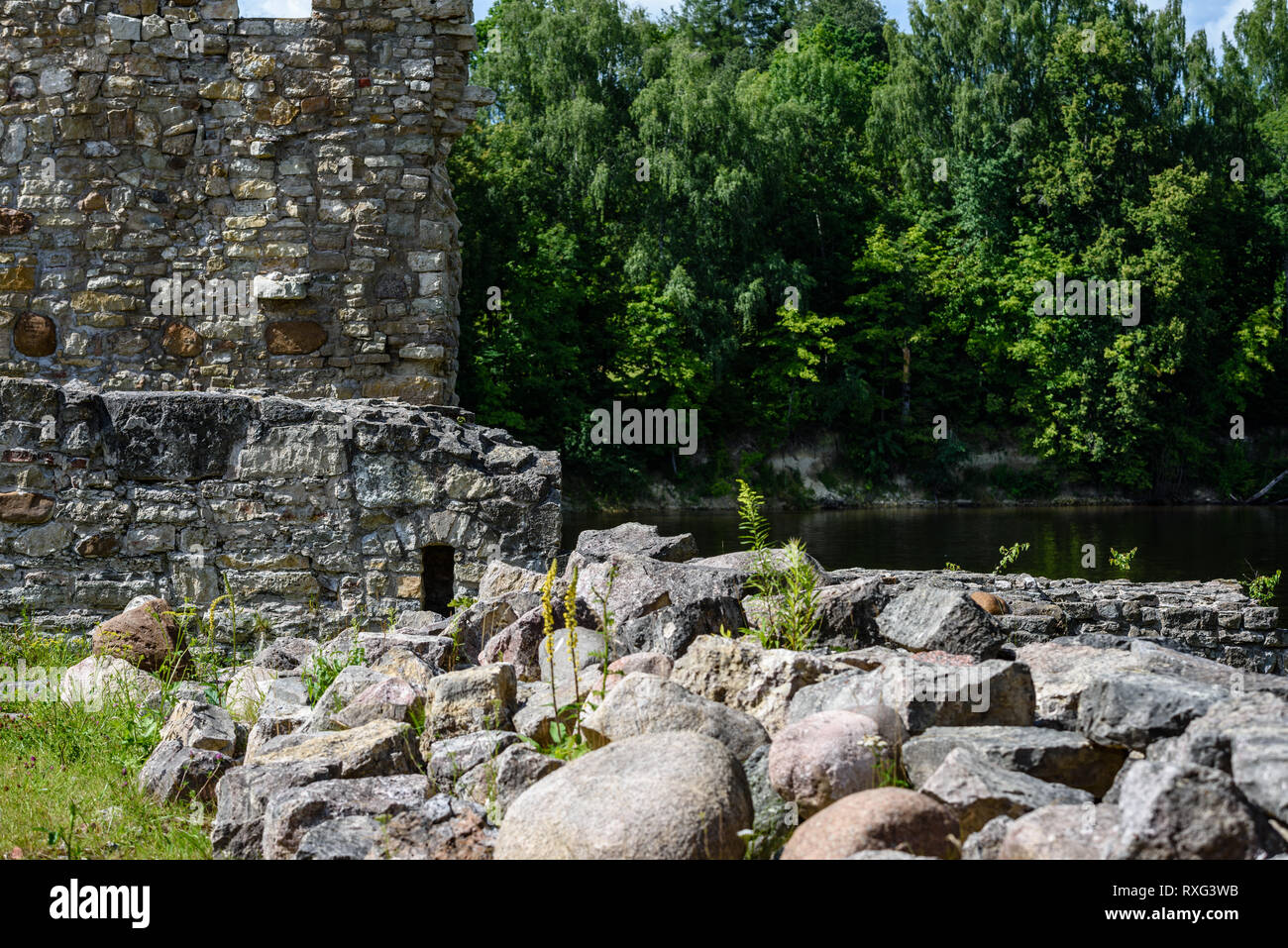 ancient stone building castle details. ruins in nature near water Stock ...