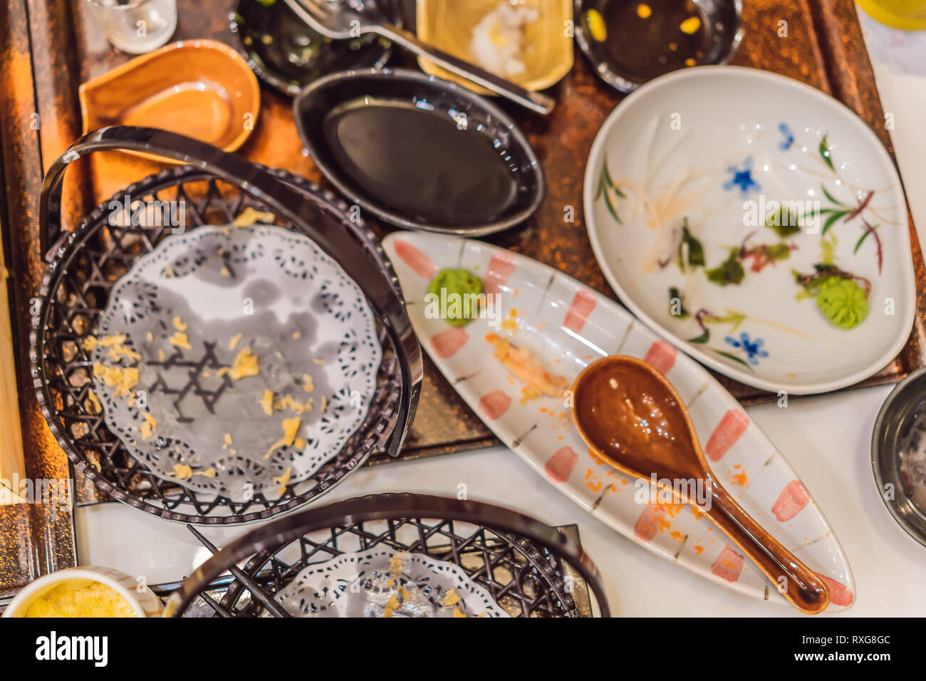 Messy table after meal in Japanese restaurant. Dirty, finish meal ...