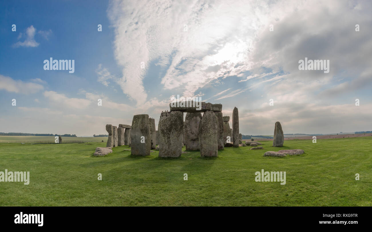 Stonehenge with blue sky and light clouds Stock Photo - Alamy